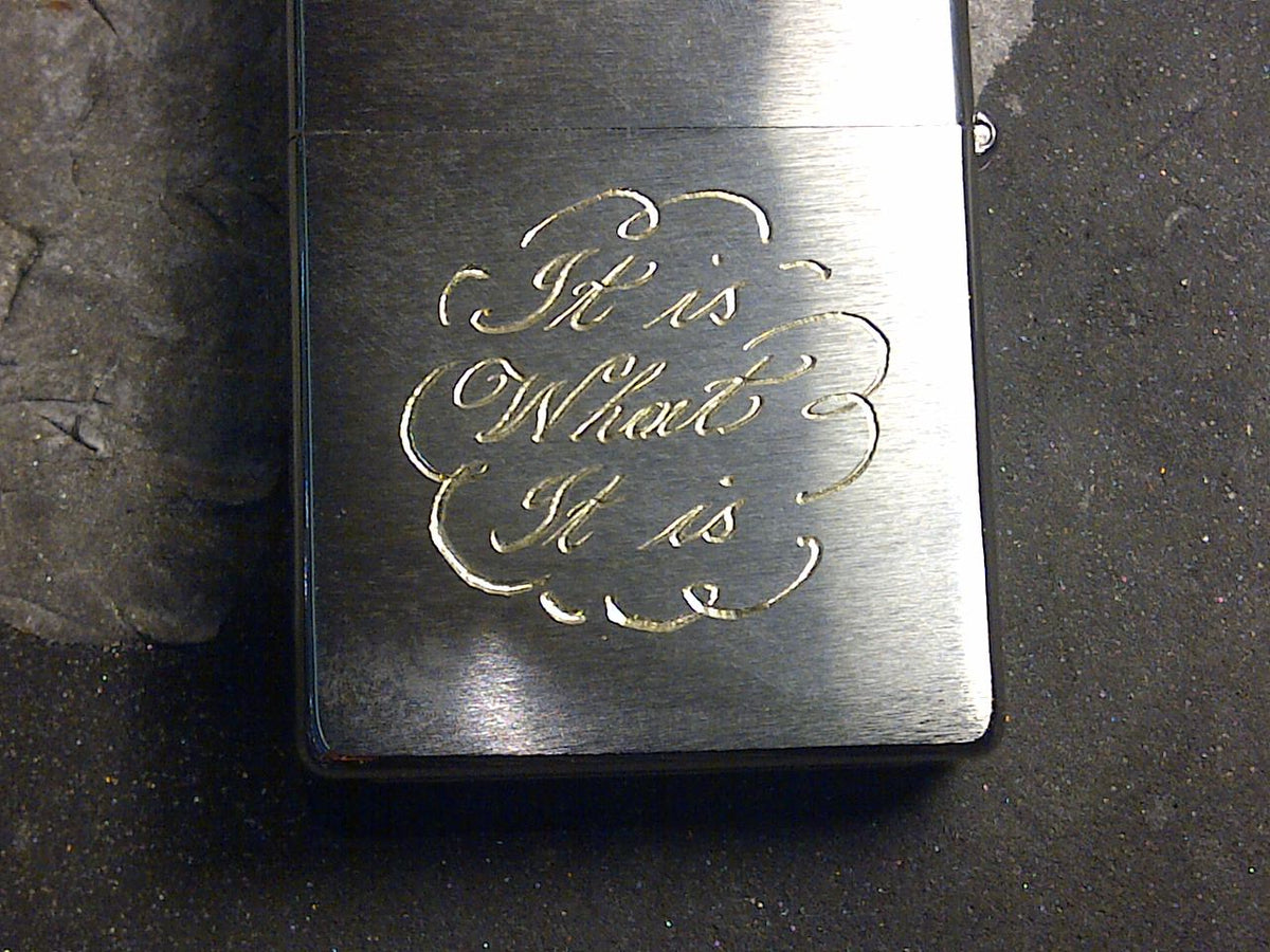 hand engraving onto zippo- this message R150 – gateway engravers